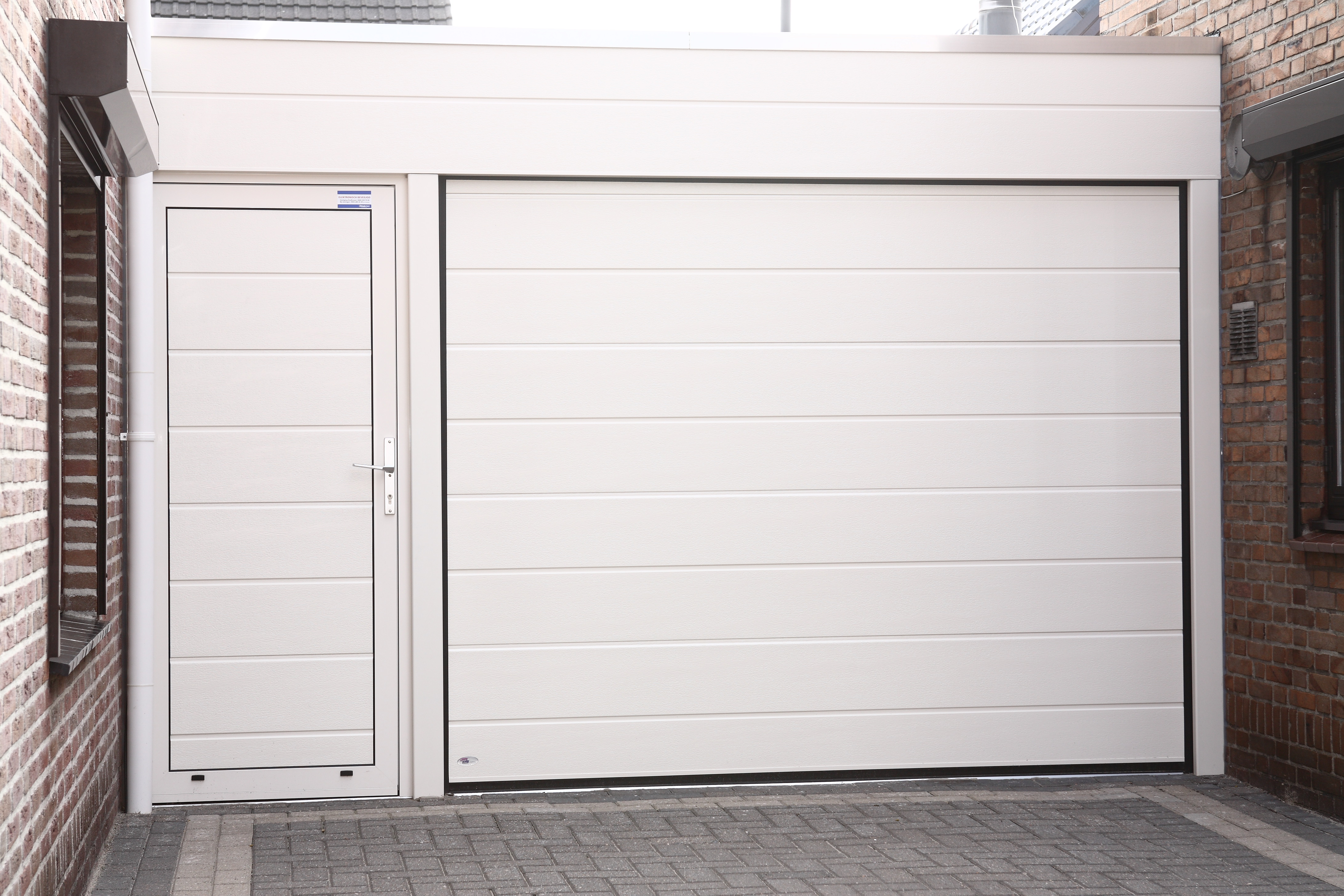 Openslaande garagedeur? | Online prijs berekenen | deGaragedeurExpert.nl